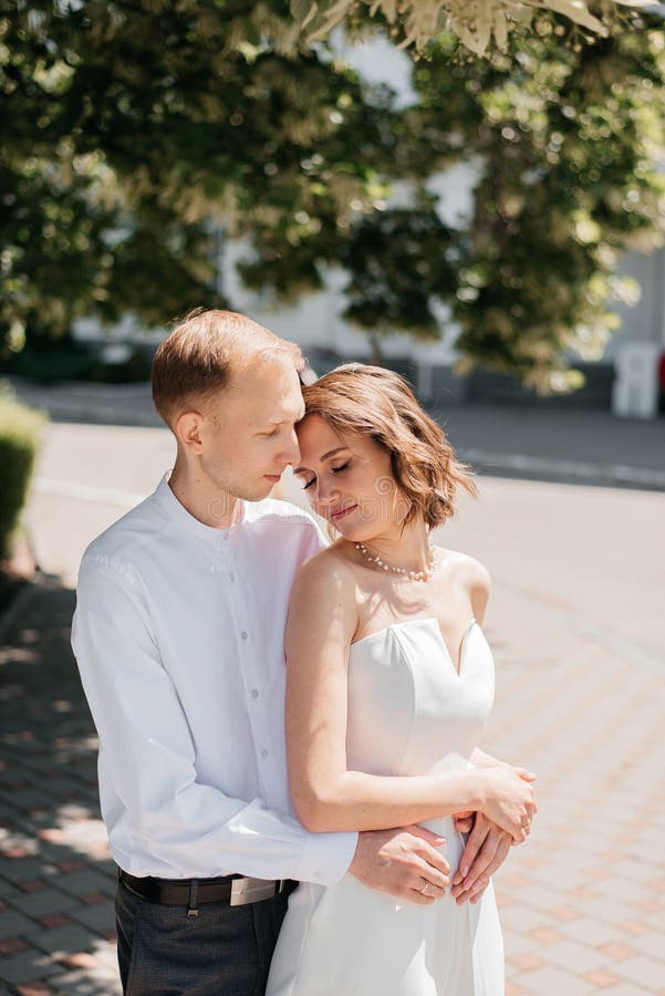 Young Wedding Couple on Their Wedding Stock Image - Image of outdoor ...
