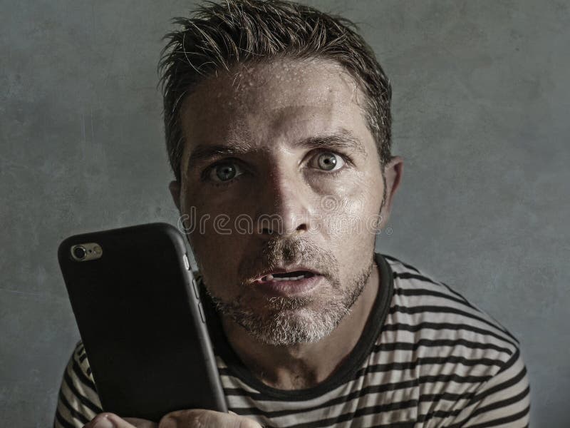 Freak and Weird Looking Man Using Mobile Phone Watching Something ...