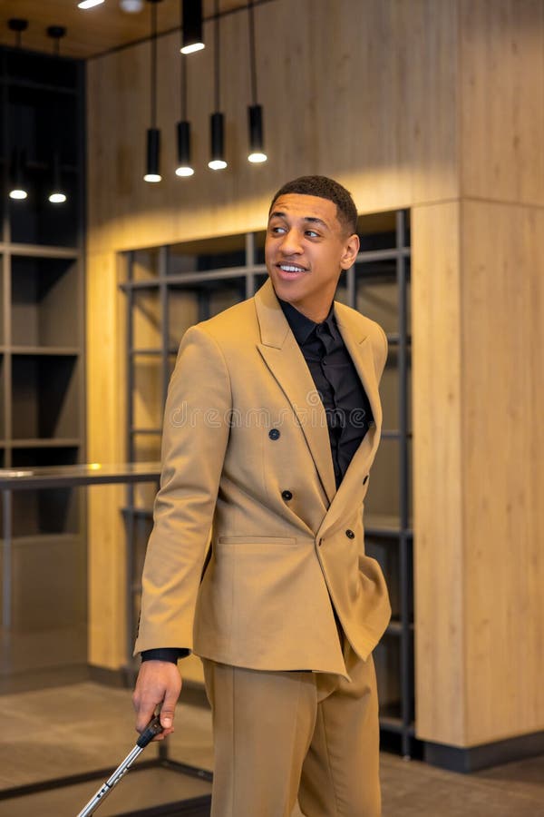 Young Well-dressed Businessman in a Hotel Waiting for a Room Stock ...