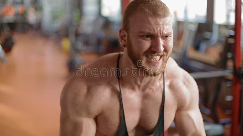 Young White Bodybuilder Training Biceps in the Gym Stock Video - Video ...