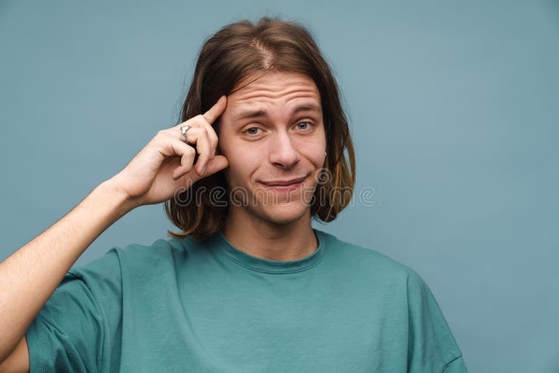 Young White Man Smiling and Pointing Finger at His Head Stock Image ...