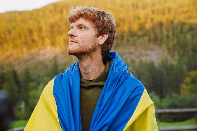 Young White Man Wrapped in Ukrainian Flag Walking in Forest Stock Photo ...