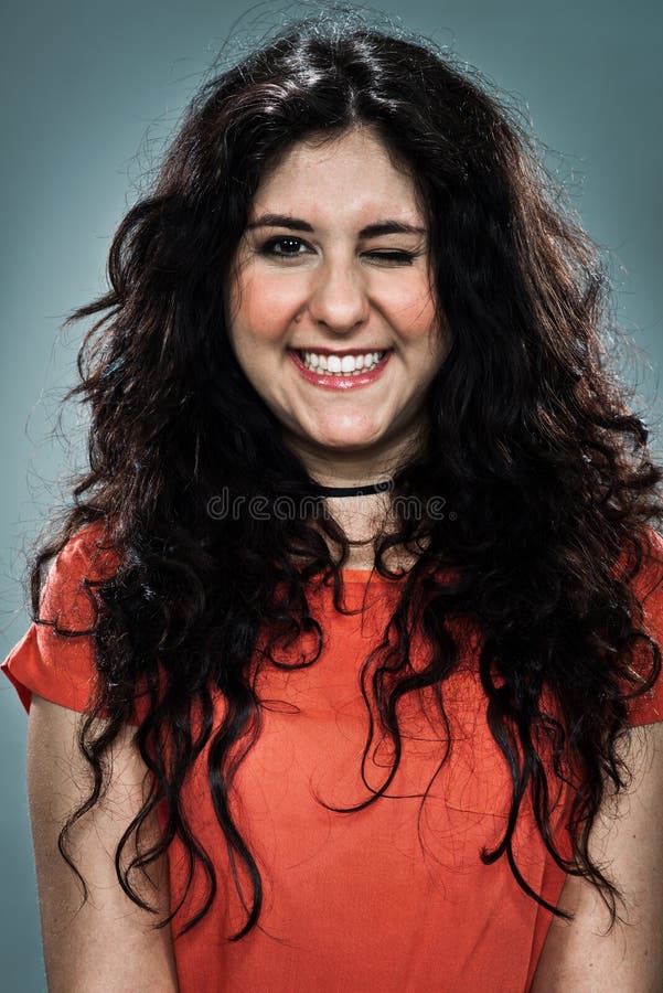 Young Winking Girl stock image. Image of laughing, expression - 29667673