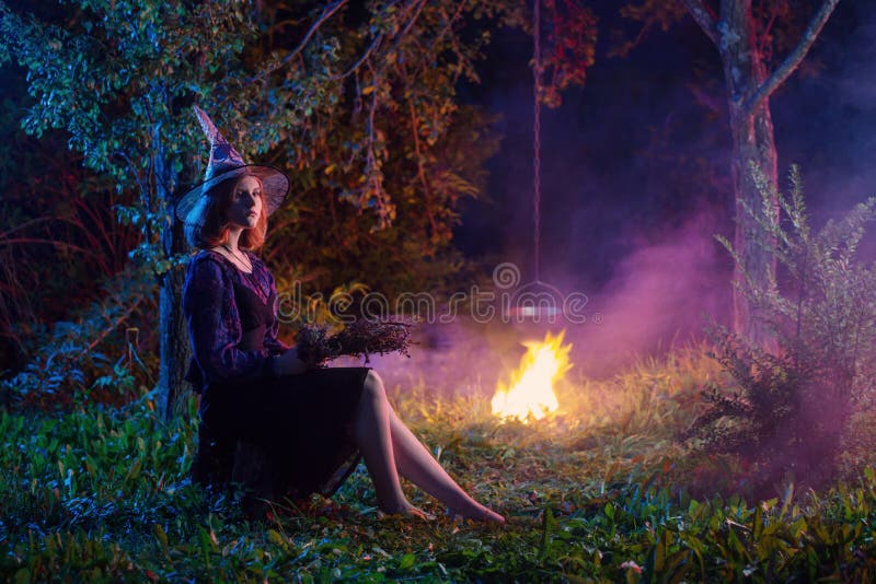 Young Witch by Fire in Night Forest Stock Photo - Image of blue, gothic ...
