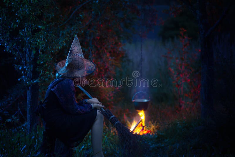 Young Witch by Fire in Night Forest Stock Photo - Image of gothic, blue ...