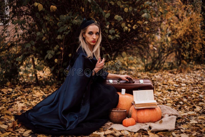 A Young Witch in the Forest Makes a Spell. Magic in the Forest ...
