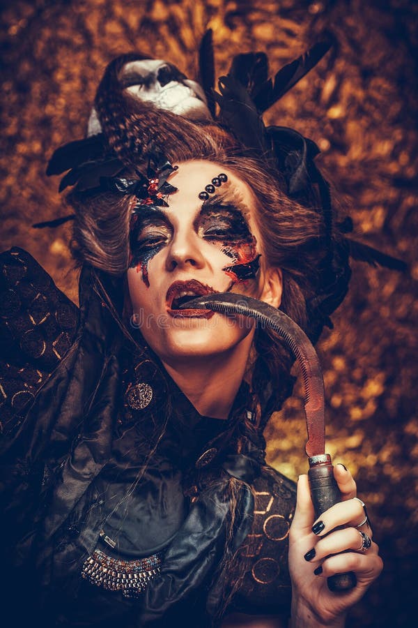Young Witch Hloding Sickle. Bright Make Up, Skull, Smoke- Halloween ...