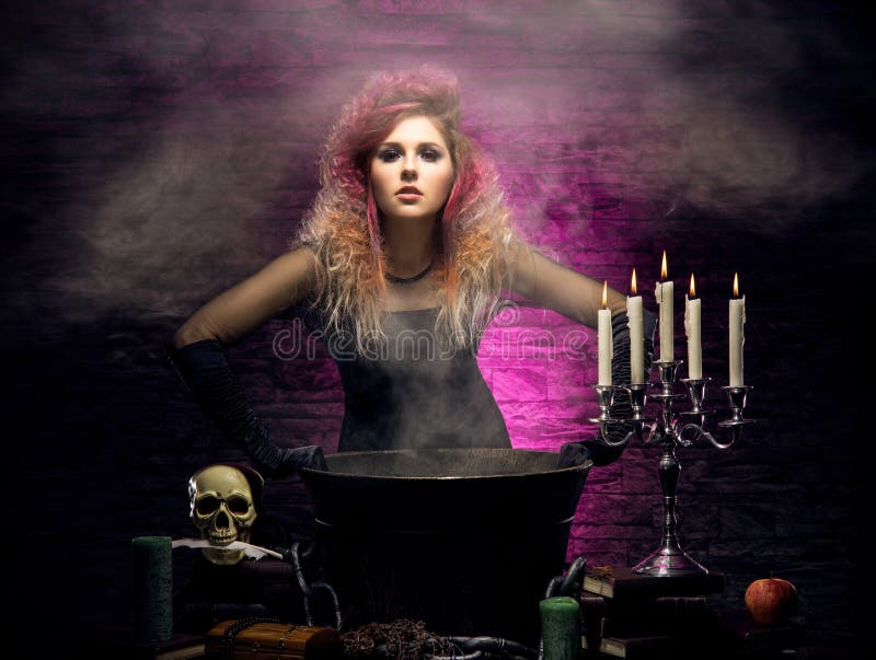 Young Witch Making Witchcraft in a Hallowen Dungeon Stock Photo - Image ...