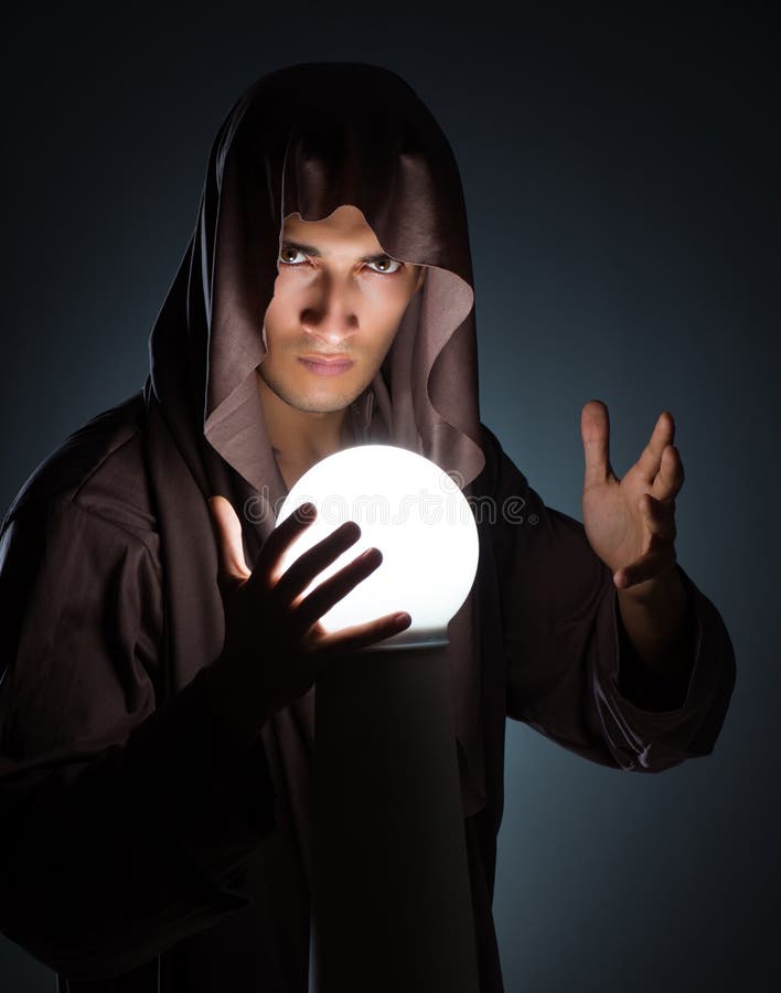 Young Wizard with Crystal Ball in Dark Room Stock Image - Image of ...