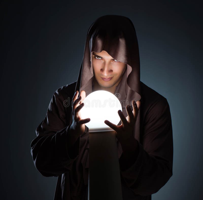 Young Wizard with Crystal Ball in Dark Room Stock Image - Image of ...