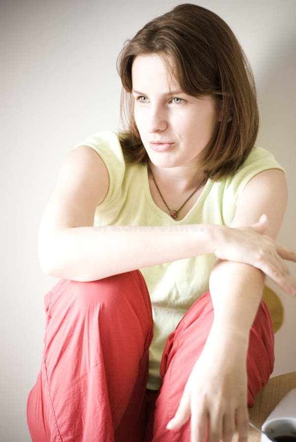 Woman Sitting Down, Glancing Back Stock Image - Image of cute ...