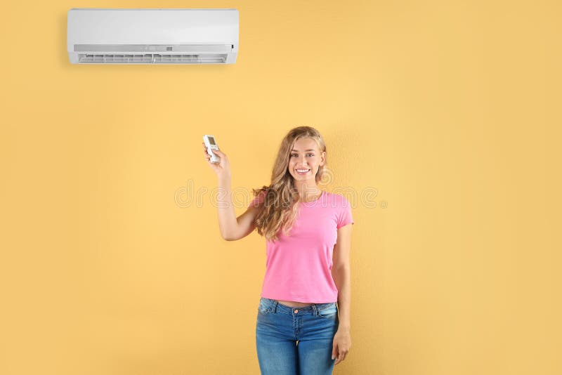 Young Woman with Air Conditioner Remote Stock Image - Image of cooler ...