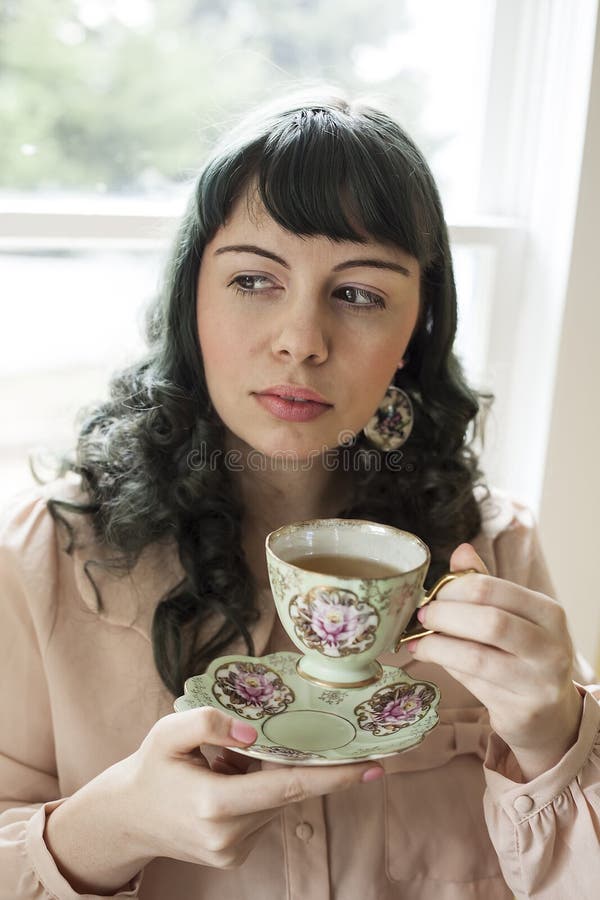 Young Woman with Antique Tea Cup Stock Image - Image of model, hair ...