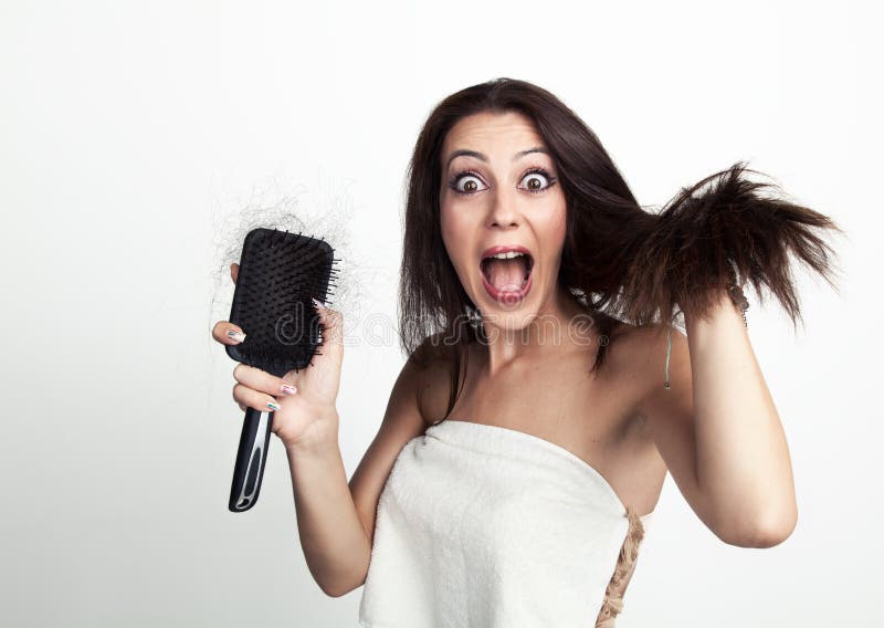 Young woman is appalled stock image. Image of brush, anxiety - 63164371