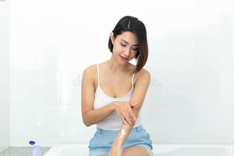 Young Woman Applying Body Lotion Cream After Bath Stock Image Image