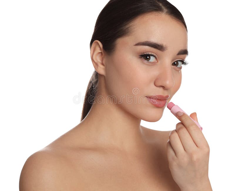 Young Woman Applying Lip Balm on White Background Stock Image - Image ...