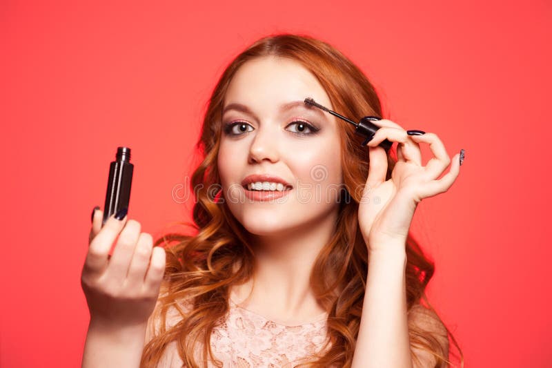Young Woman Applying Make Up Stock Photo - Image of cosmetic, cosmetics ...