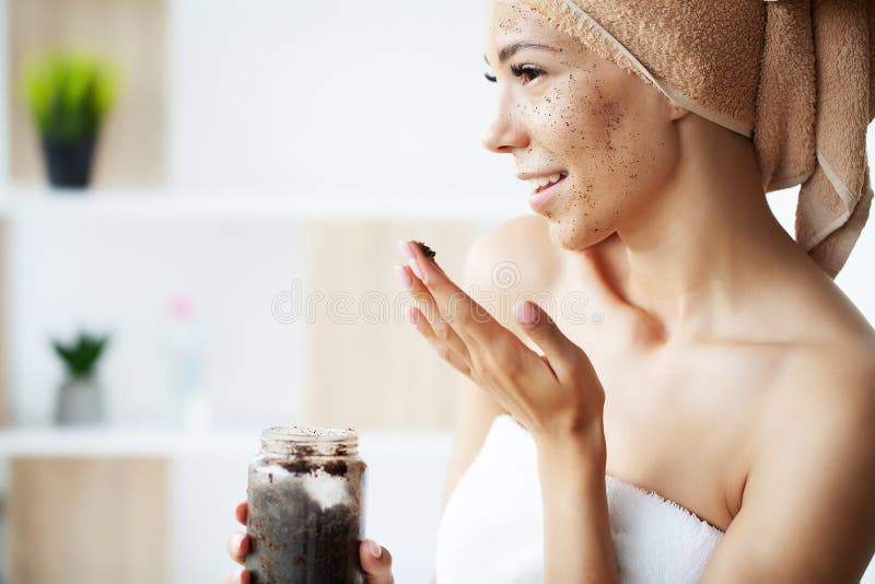 Young Woman Applying Scrub on Face in Bathroom Stock Image - Image of ...