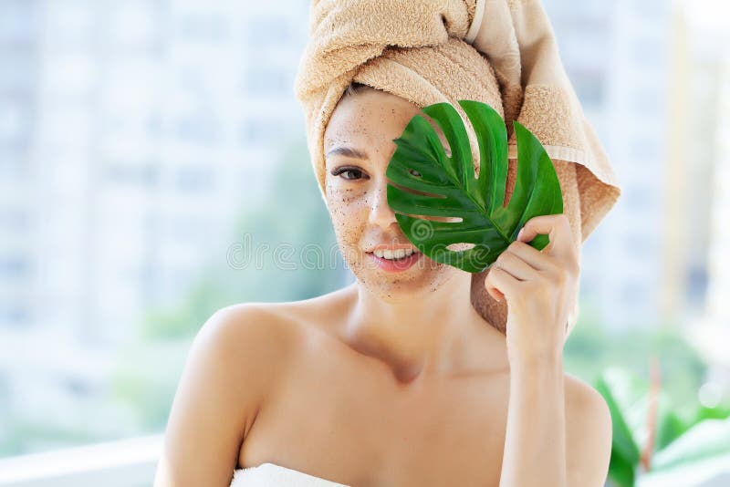Young Woman Applying Scrub on Face in Bathroom Stock Photo - Image of ...