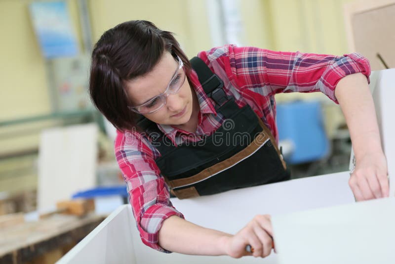 Young Woman Apprentice of Carpentry Assembling Stock Image - Image of ...