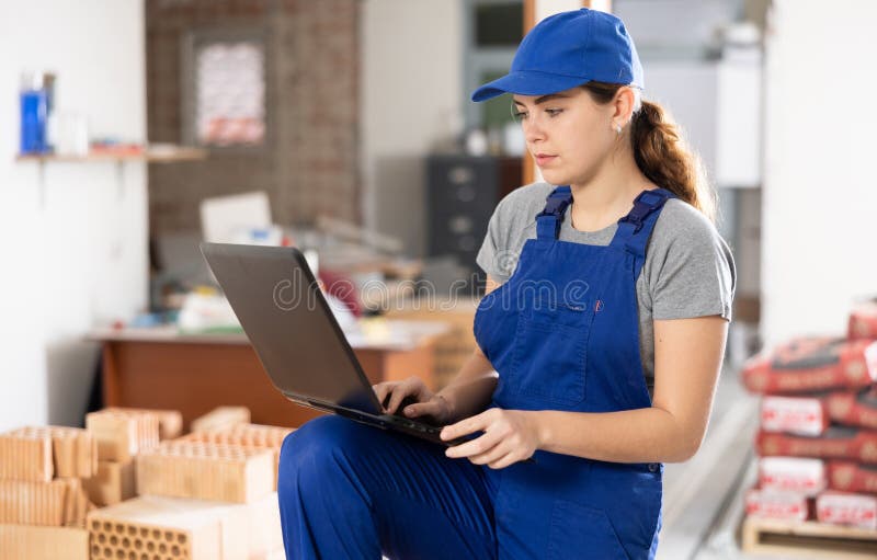 Woman with Laptop on Indoor Construction Site Stock Photo - Image of ...