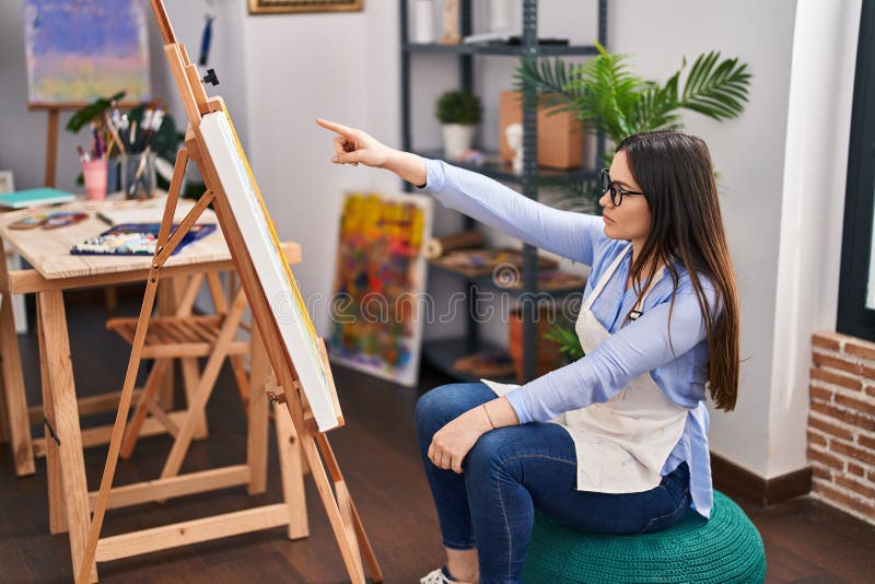 Young Woman Artist Looking Drawing at Art Studio Stock Image - Image of ...