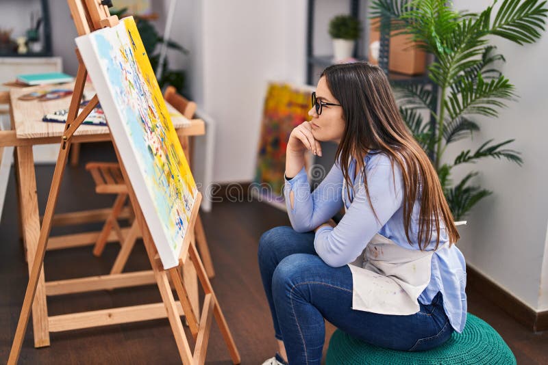 Young Woman Artist Looking Drawing at Art Studio Stock Photo - Image of ...