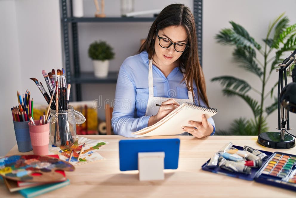 Young Woman Artist Using Touchpad Drawing on Notebook at Art Studio ...