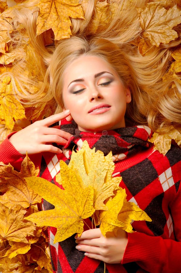 Young Woman with Autumn Leaves Stock Photo - Image of leaves, beauty ...