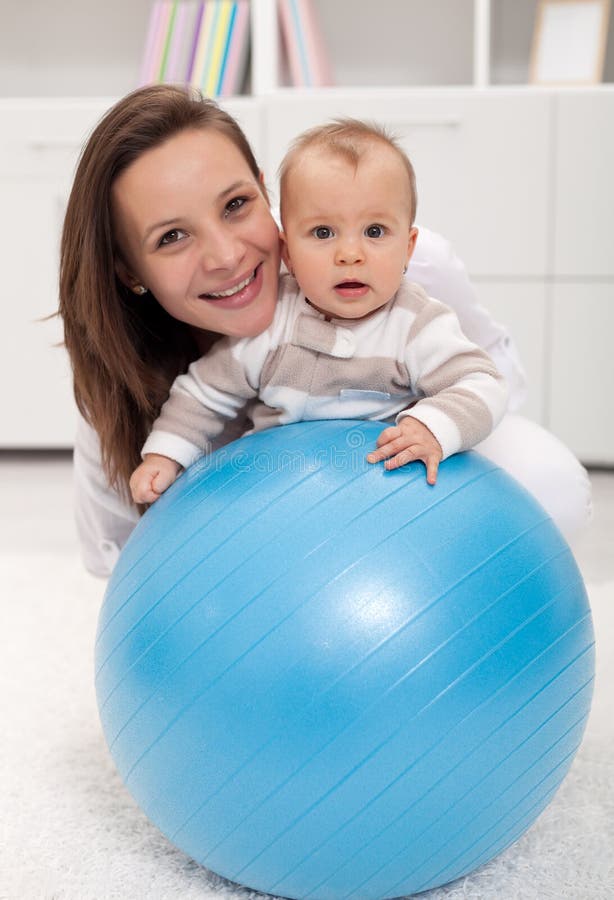 Young woman and baby stock image. Image of love, laugh - 23494311