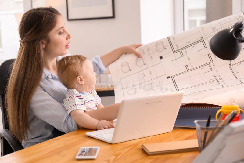 Young Woman with Baby Working in Office Stock Image - Image of network ...