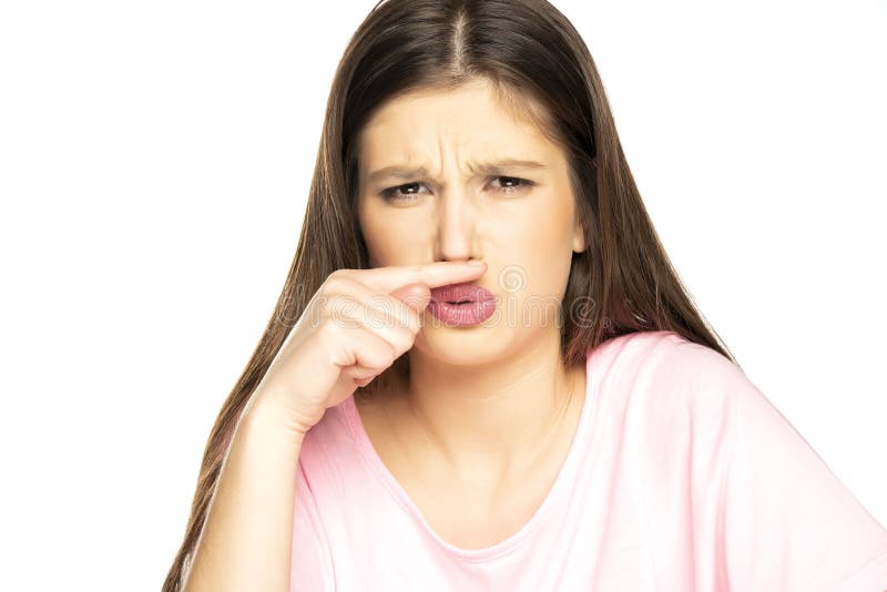 Young Woman with Bad Smell Gesture Stock Photo - Image of expression ...