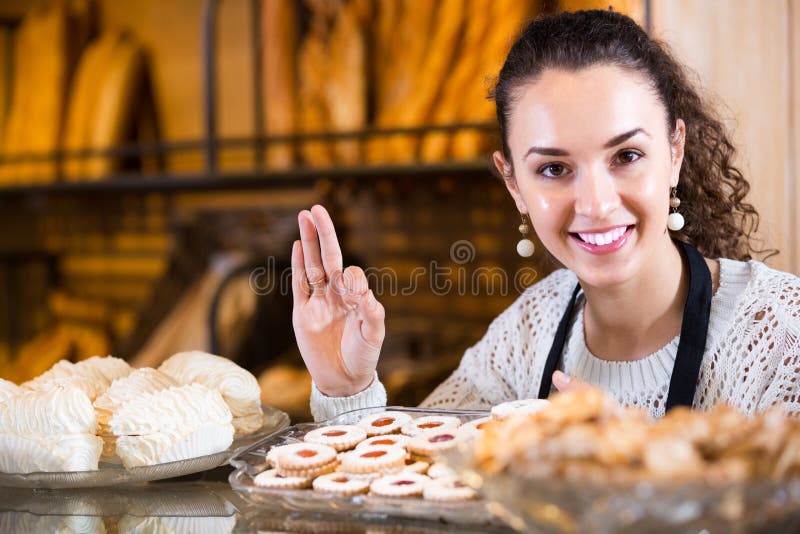 Young Woman at Bakery Display Stock Image - Image of coffee, bakery ...