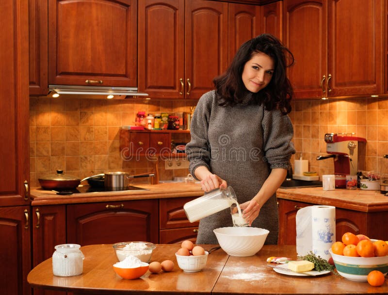 Young woman baking at home stock photo. Image of diet - 83429650