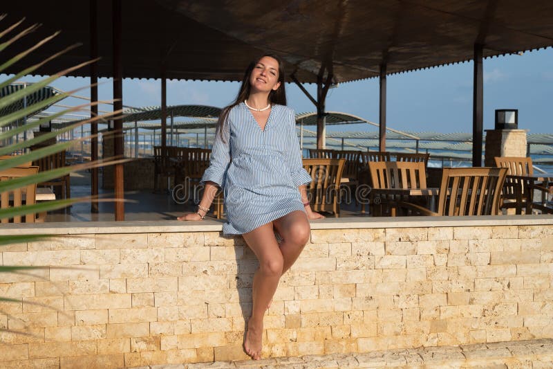 Young Woman Basking in the Sun Stock Image - Image of golden, model ...
