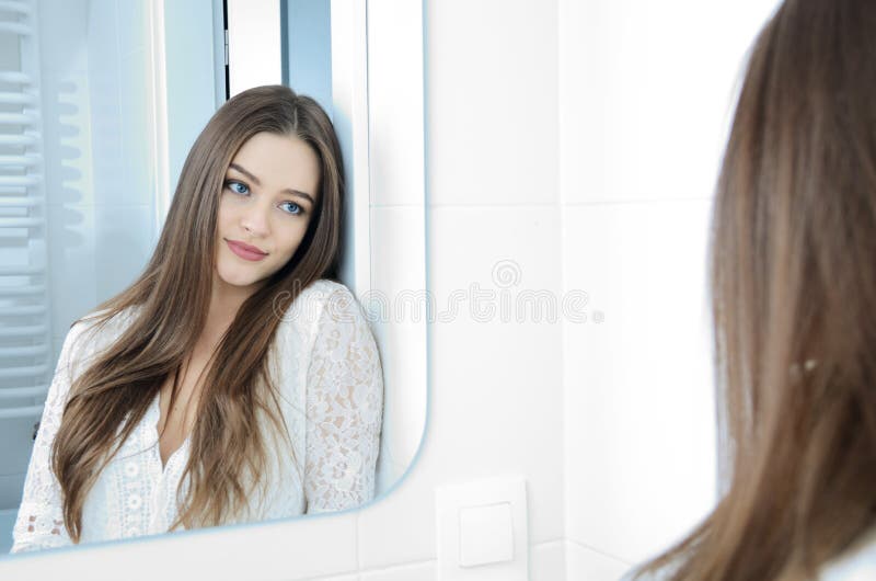 Smiling Woman with Reflection in the Mirror Stock Image - Image of ...