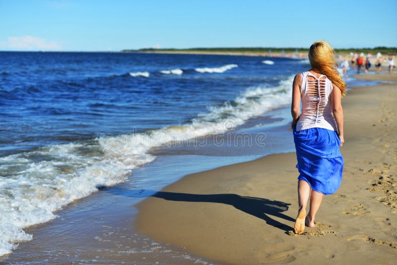 Young woman on beach stock photo. Image of coast, outdoors - 89814764
