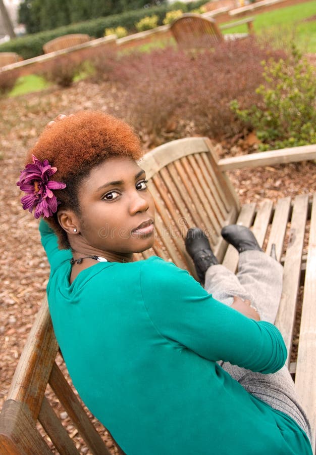 Young Woman on Bench stock image. Image of lips, outdoors - 27916765