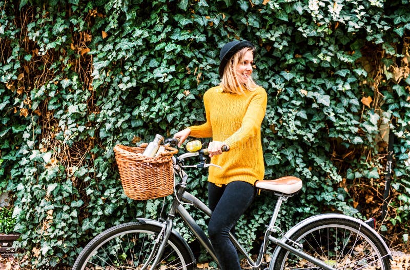Young Woman with Bicycle in Sunny Spring Nature. Stock Photo - Image of ...