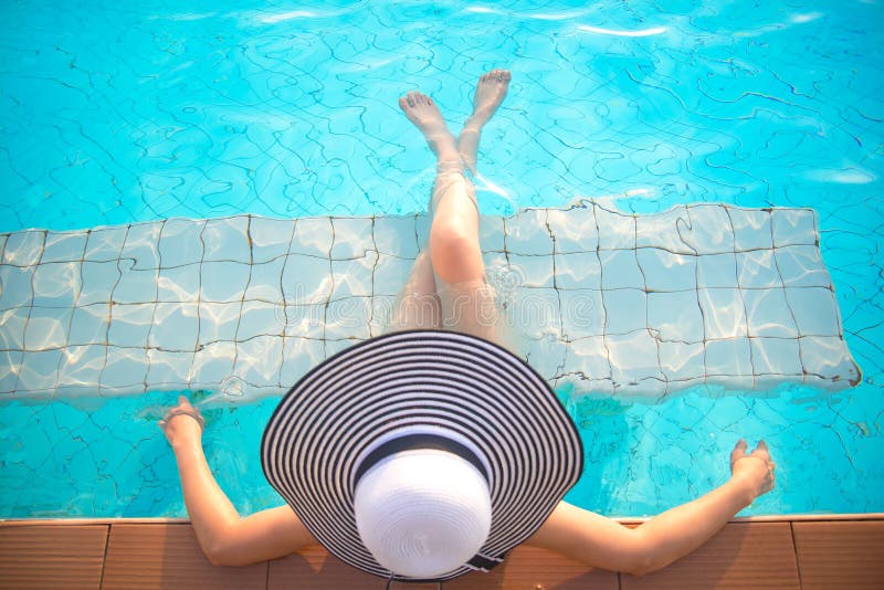 Young Woman in Big Hat Relaxing Stock Photo - Image of relaxing, blue ...