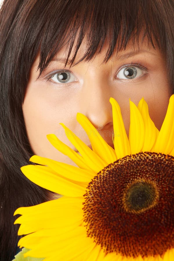 Young Woman with a Big Sun Flower Stock Photo - Image of seventies ...