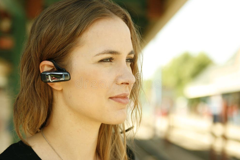 Young Woman Bluetooth Headset Stock Photo - Image of head, station: 2763102
