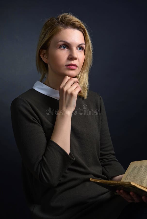 Young woman with book . stock image. Image of education - 92904075