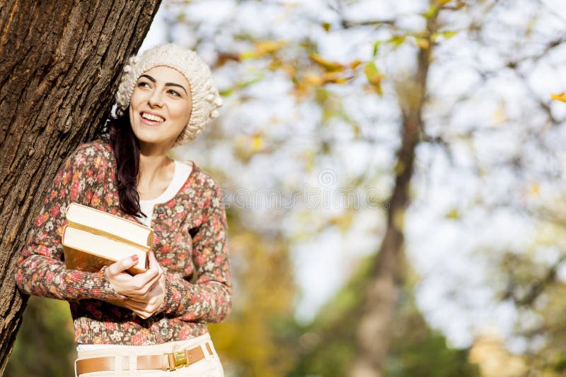 Young woman with books stock photo. Image of leisure - 27872204