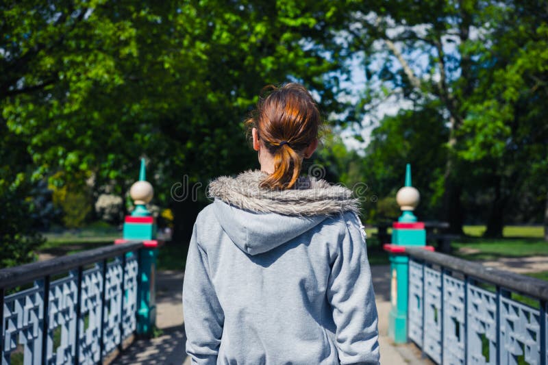 Young Woman on Bridge in Park Stock Photo - Image of nature, leisure ...