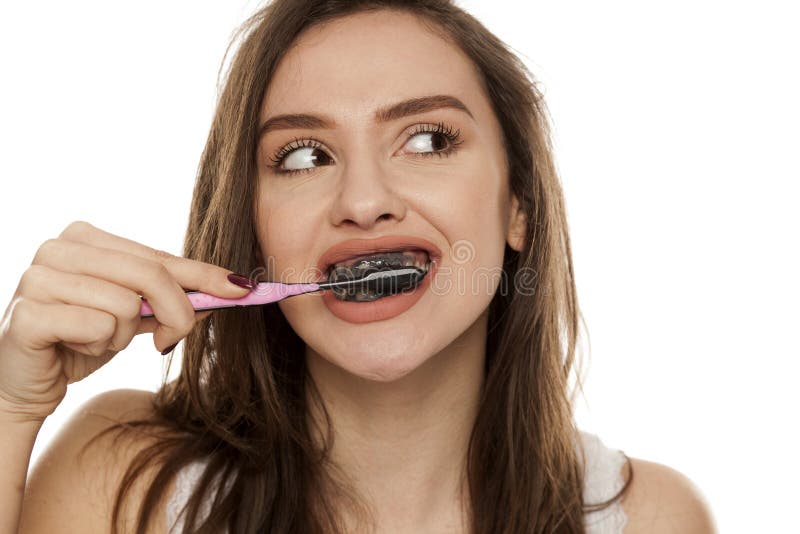 Active Charcoal Tooth Paste Stock Photo - Image of woman, mouth: 118400816