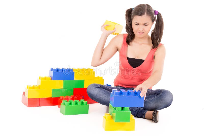 Young Woman Building with Colorful Blocks Stock Photo - Image of blocks ...