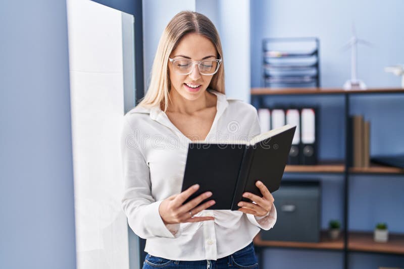 Young Woman Business Worker Reading Book at Office Stock Image - Image ...