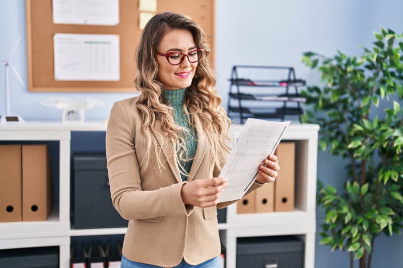 Young Woman Business Worker Reading Document at Office Stock Image ...