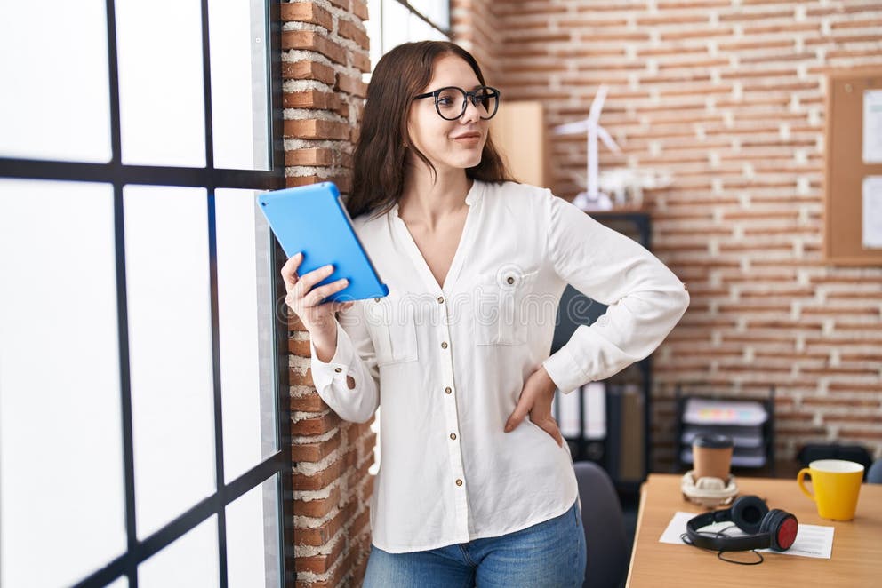 Young Woman Business Worker Using Touchpad Working at Office Stock ...